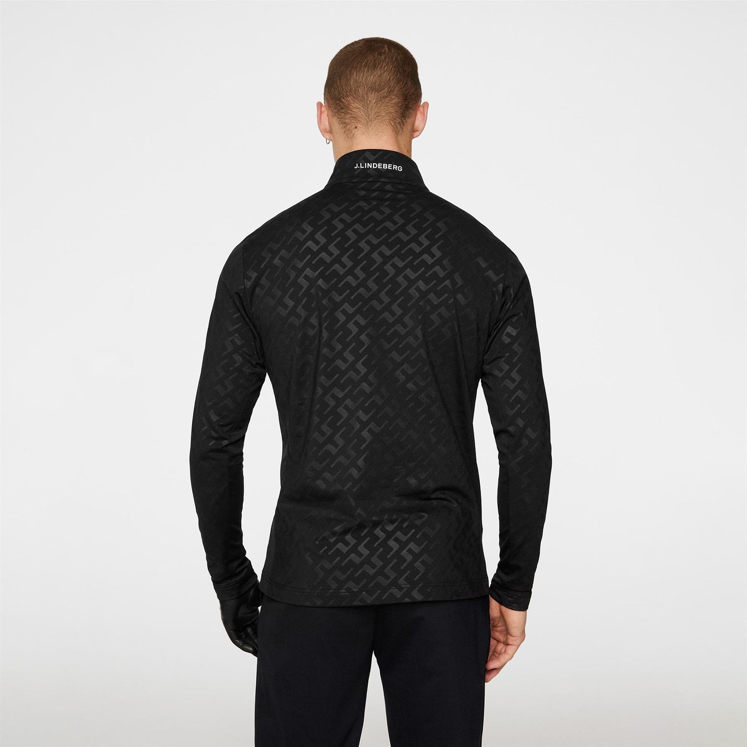 J.Lindeberg Luke Deboss Mid Layer Bias Bridge Black | TRENDYGOLF UK
